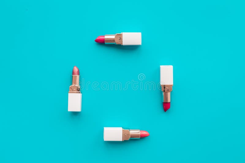 Lipsticks Assorted Colors on Yellow Background Top View Copyspace Stock ...