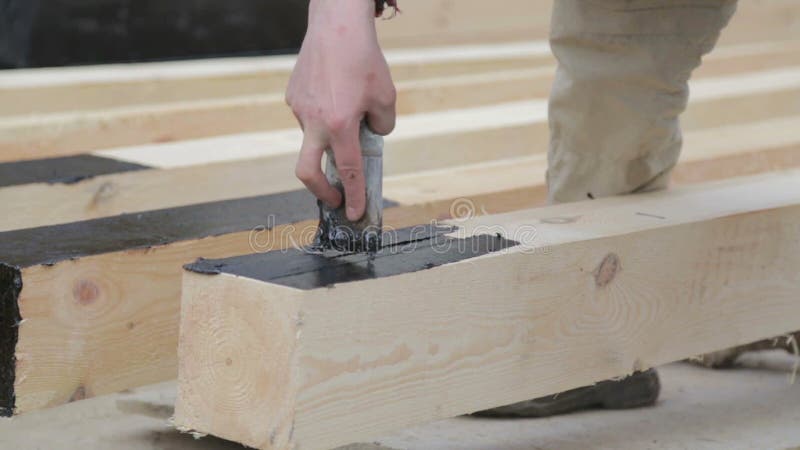 Liquid Bitumen is Applied To the Wood Beam. Stock Footage - Video of ...