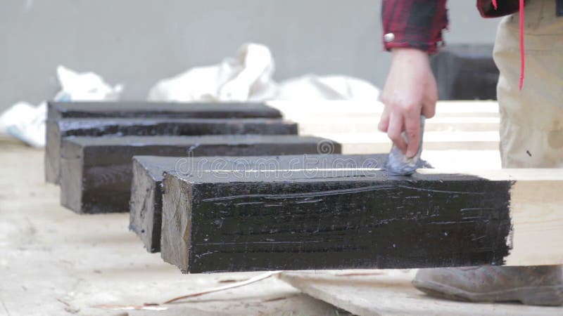 Liquid Bitumen is Applied To the Wood Beam. Stock Footage - Video of ...