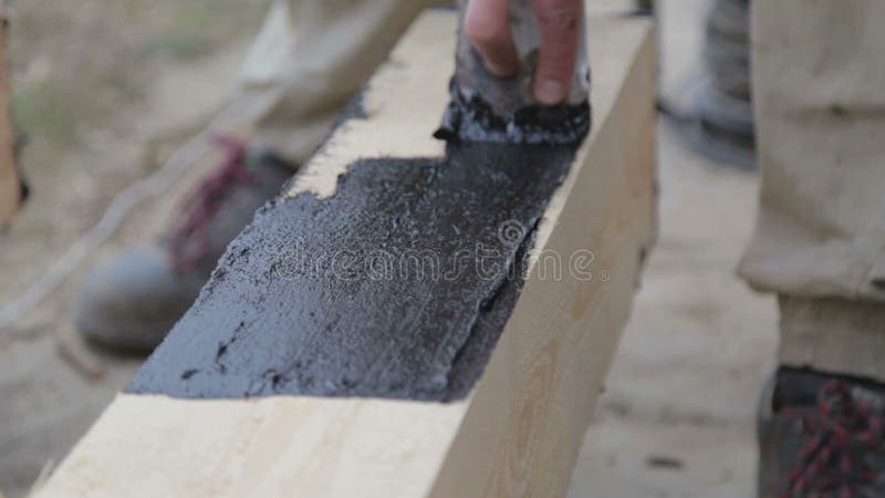 Liquid Bitumen is Applied To the Wood Beam. Stock Footage - Video of ...