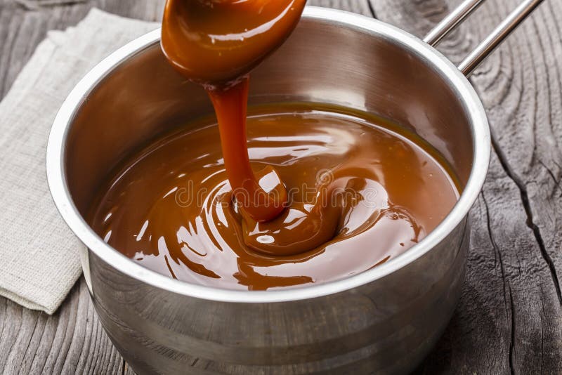 Liquid caramel is poured stock photo. Image of healthy - 48094486