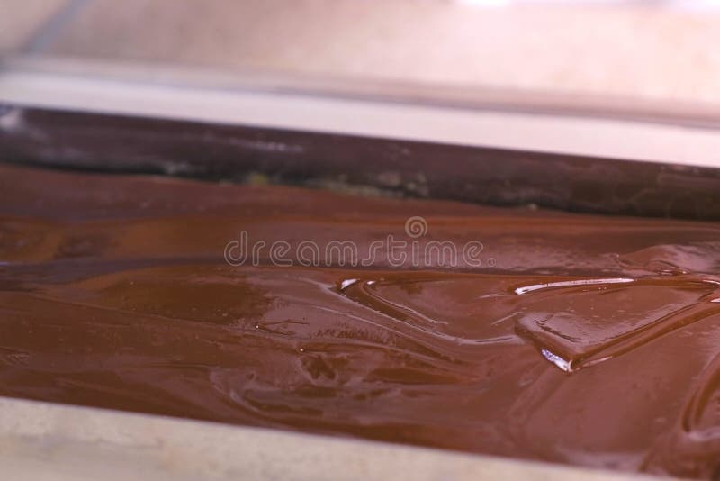 Liquid Chocolate Filling for Sweets on a Baking Sheet. Stock Image ...