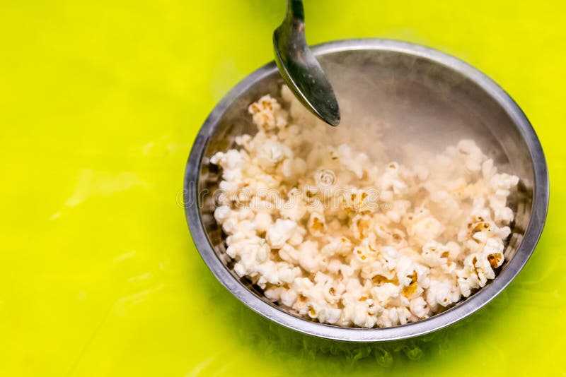 Liquid Cold Nitrogen is Poured into the Popcorn for Crystallizing. a ...