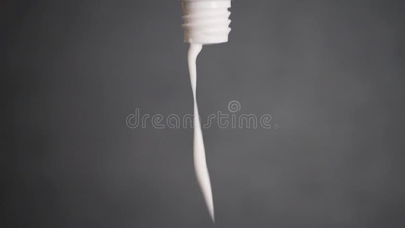 Liquid Cream Texture Flows from the Tube Stock Footage - Video of cream ...