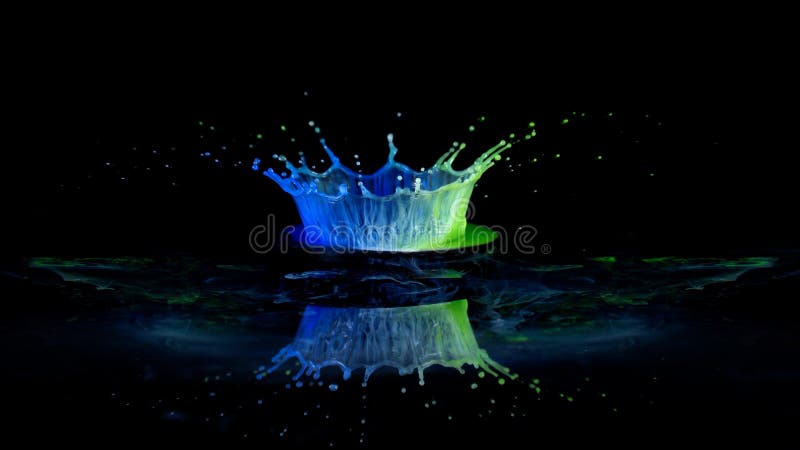 Liquid Drop Art Crown Shape on a Button in Water Stock Photo - Image of ...