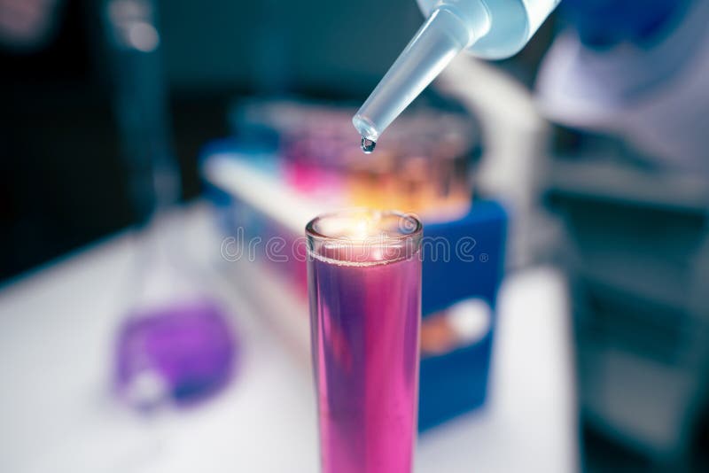 Liquid Drop Falling into Test Tubes Stock Photo - Image of analysis ...