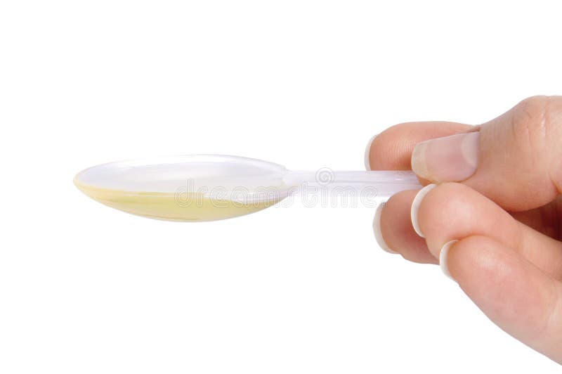 Liquid drugs in a spoon stock image. Image of bottle - 21573387