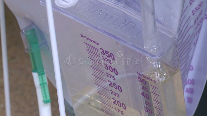 Red Liquid Flows through Spiral Tube in Laboratory Equipment Stock ...