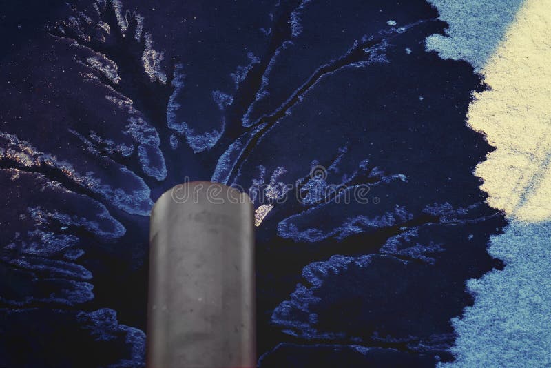 Liquid Flows from the Pipe into the Lake and Melts the Ice. There is a ...