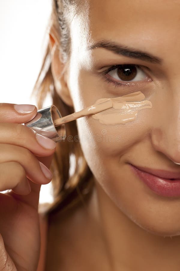 Liquid foundation apply stock photo. Image of facial - 86076146