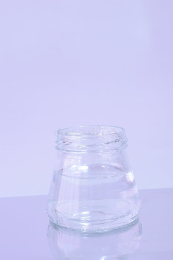 Liquid in a glass jar stock photo. Image of transparent - 56982376