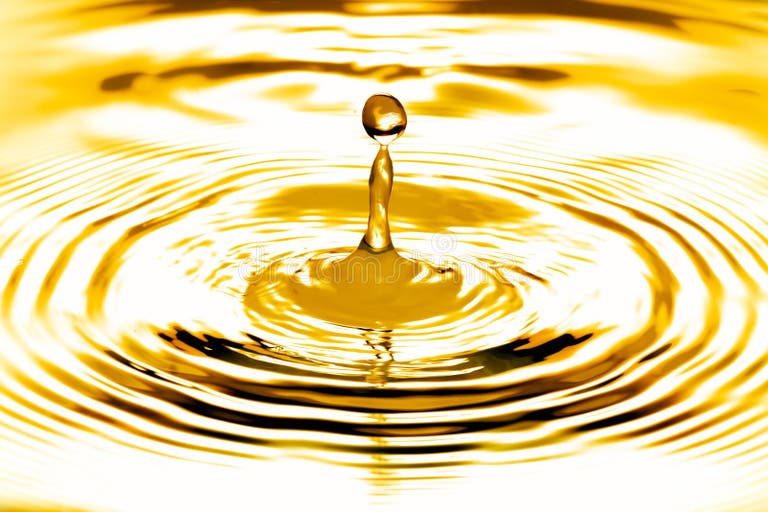 Liquid Gold Drop and Ripple Stock Photo - Image of ripple, metallic ...
