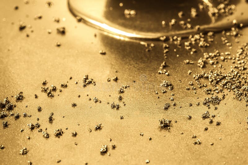 Liquid Gold, Gold Dust on a Gold Background. Stock Image - Image of ...