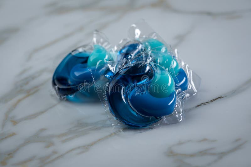 Liquid Laundry Detergent Pods with Gel and Softener in Blue Stock Image ...