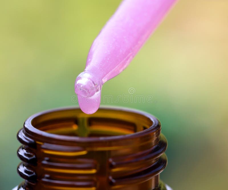 Dropper with pink syrup stock image. Image of safe, drop - 26417213