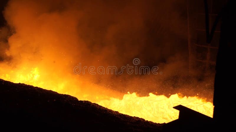 Liquid Metal from Blast Furnace. Liquid Metal Pouring Stream Stock ...