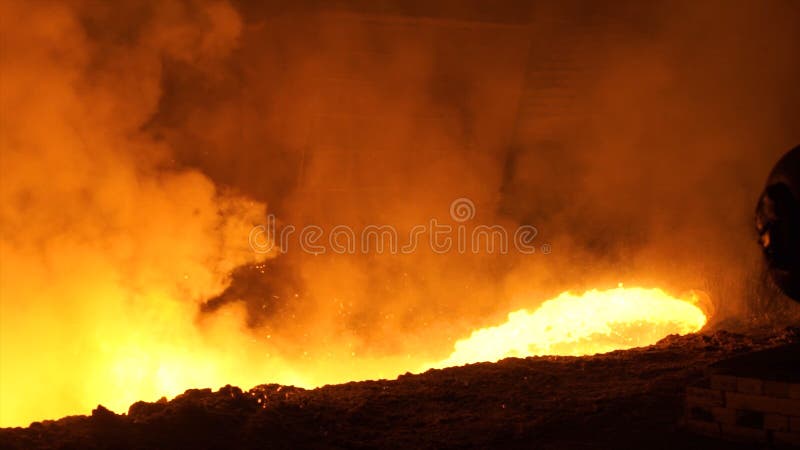 Liquid Metal from Blast Furnace. Liquid Metal Pouring Stream Stock ...