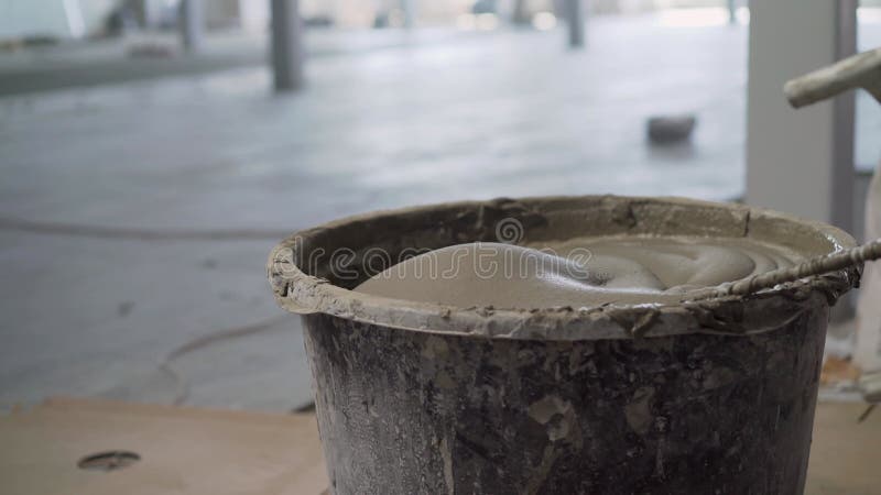Glue Solution in a Bucket. Bucket with Solution Close-up. Laying Large ...