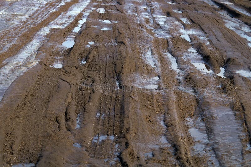 Liquid Mud on a Dirt Road.Car Tire Tracks Stock Image - Image of ...