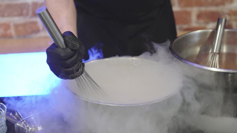 Liquid nitrogen is stirred stock video. Video of hobby - 346198735