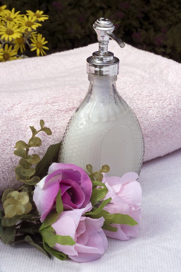 Liquid soap and flowers stock photo. Image of towel, liquid - 14953956