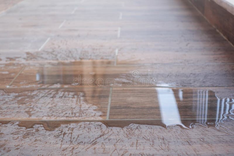 Liquid Spilled on a Floor , Stock Image - Image of plastic, droplet ...