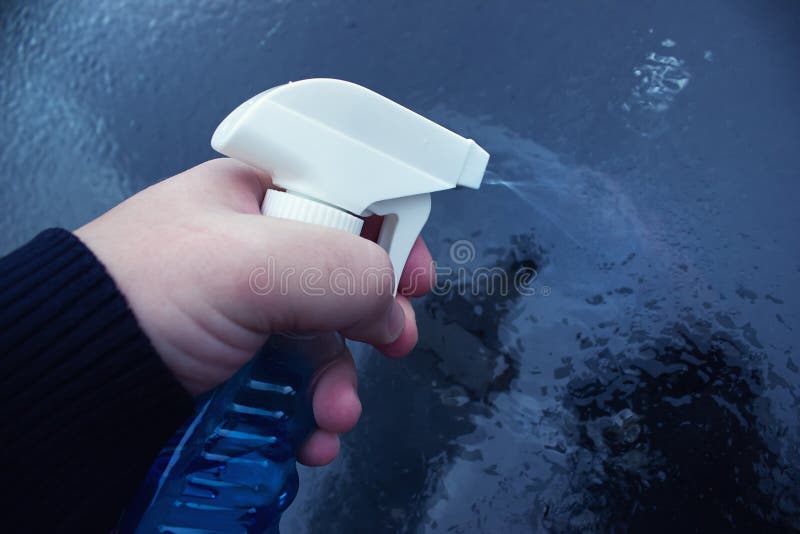 Liquid Spray for Car Window Defrost in Winter Season. Stock Photo ...