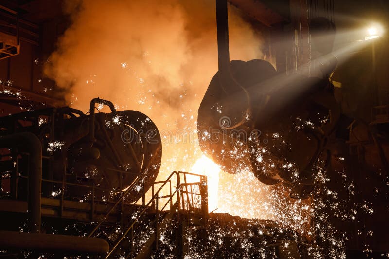 A Metallurgical Ladle Filled with Molten Metal Bucket is Suspended on a ...