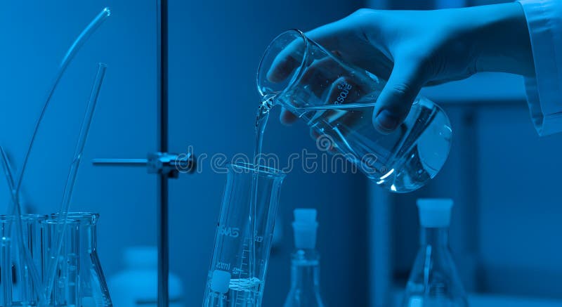 Liquid Transfer in Lab: a Blue-Toned Scientific Experiment Stock ...