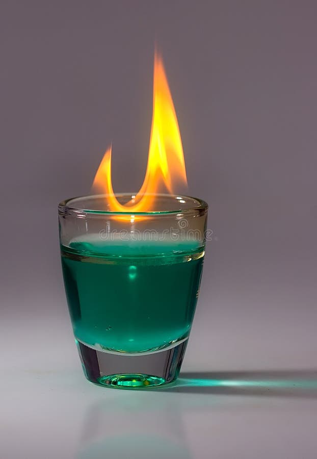 Liquor on fire stock image. Image of bubbles, fire, reflected - 6537913