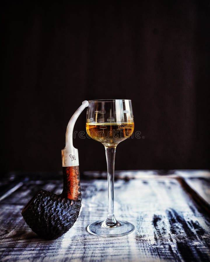 Liquor and pipe stock photo. Image of pipe, darkmoodphotography - 217318054