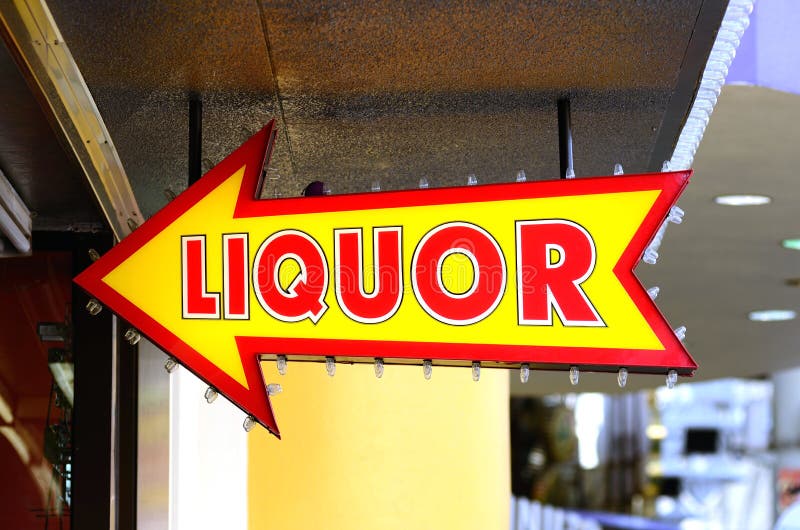 Liquor Sign stock photo. Image of dark, business, neon - 33720724