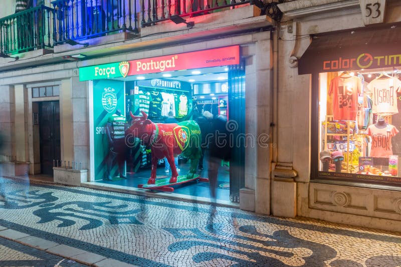 Forca Portugal Store at Night Editorial Photography - Image of green ...