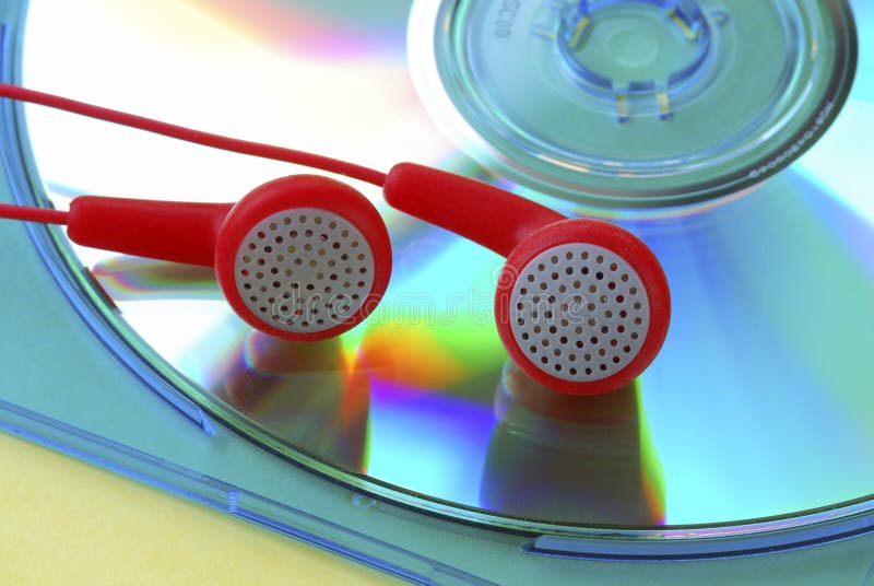 Listen Music from a MP3 CD with the Earphone Stock Image - Image of ...