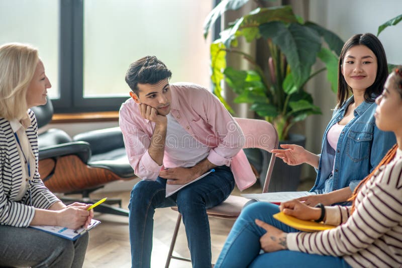 Two People Sharing a Handshake Gesture with Skyscrapers in the ...