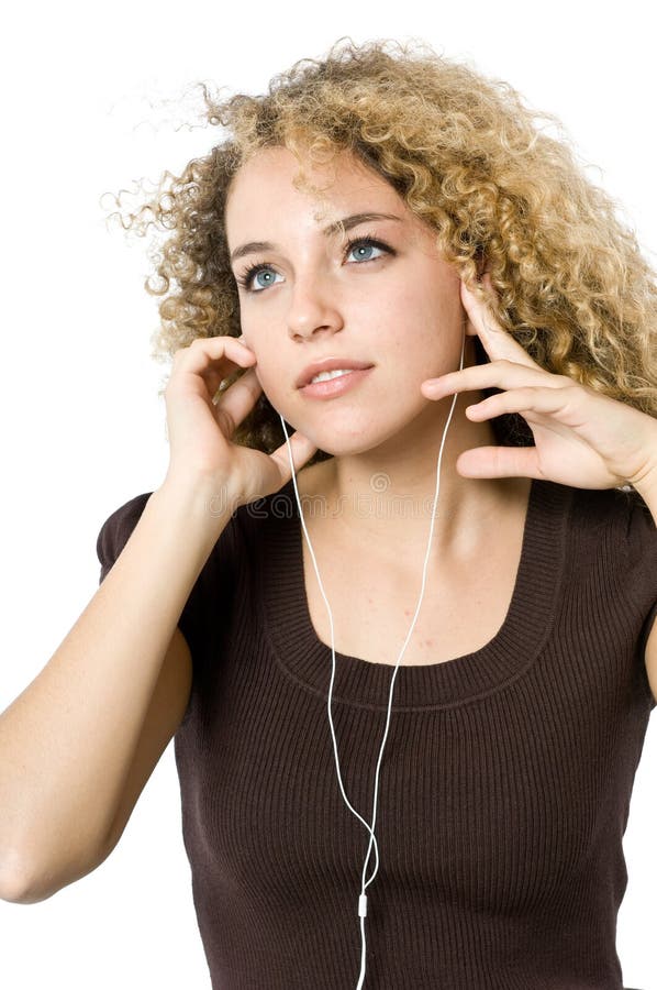 Listening to an MP3 player stock photo. Image of hair - 5071842