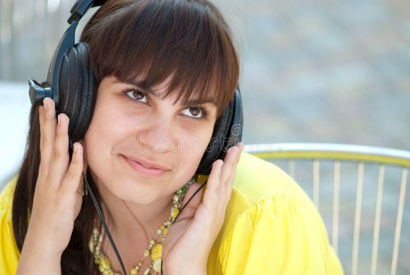 Listening to music stock photo. Image of books, college - 10796356