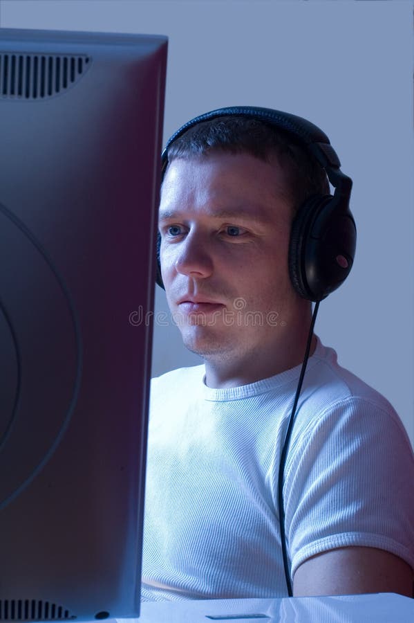 Listening To Music while Working. Stock Image - Image of concentrate ...