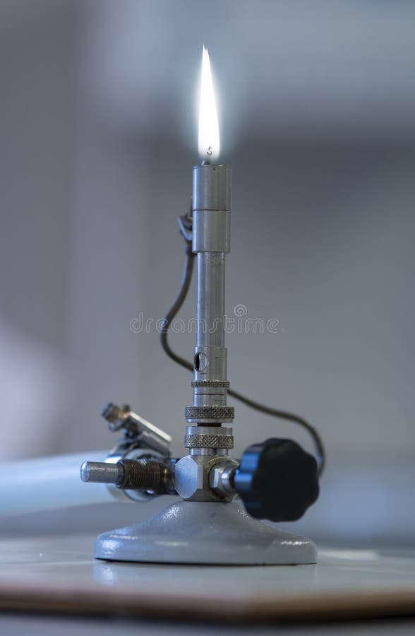 Bunsen Burner Lit stock illustration. Illustration of burner - 1128439