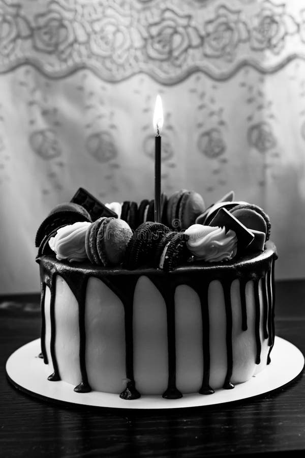 A Lit Candle Sits in the Center, Casting a Soft Glow Over the ...