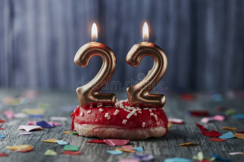 Lit Candles In The Shape Of Number 22 In A Cake Stock Image Image Of