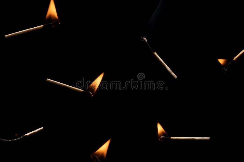 Lit Falling Match on a Black Background Stock Photo - Image of ...
