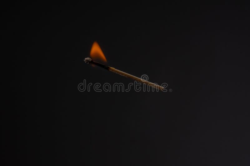 Lit Falling Match on a Black Background Stock Image - Image of single ...