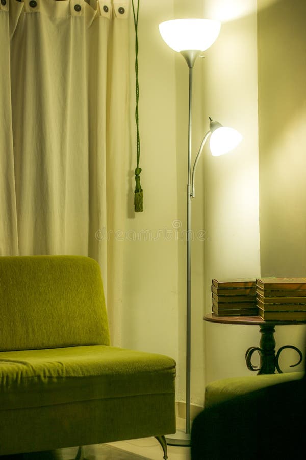 Lit Floor Lamp at the Corner of a Living Room Apartment Stock Photo ...