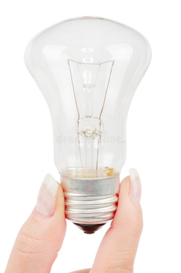 Lit lightbulb held stock image. Image of holding, glow - 264051061