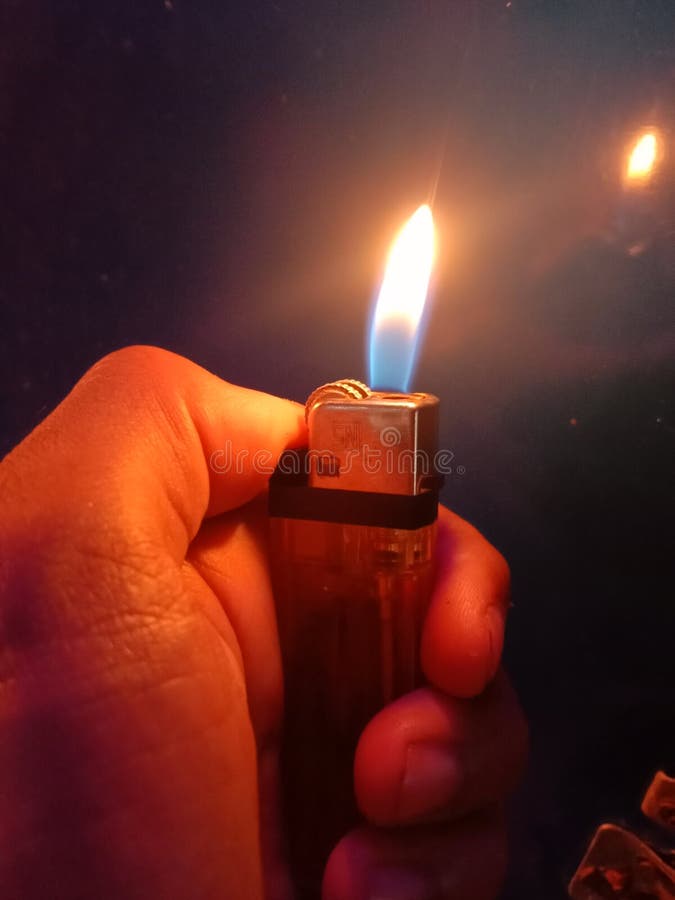 Lit match in hand editorial photography. Image of fire - 266193422