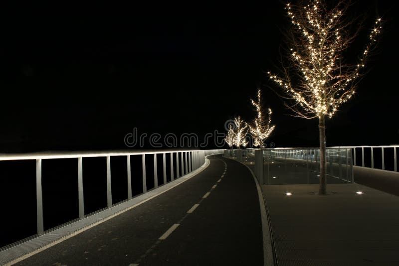 A Lit Pathway with a Leading into the Dangerous Darkness Stock Photo ...