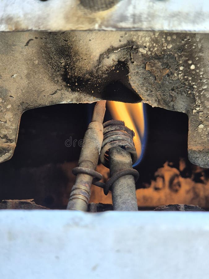 Lit Pilot Light of a Water Heater Stock Photo - Image of control ...