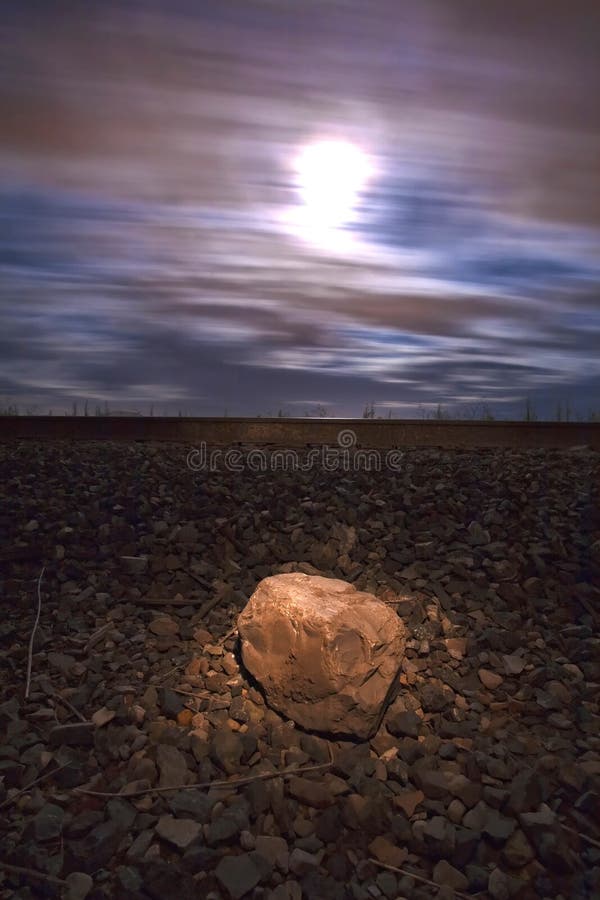 A Lit Rock at Night with a Full Moon Lighting the Stock Image - Image ...