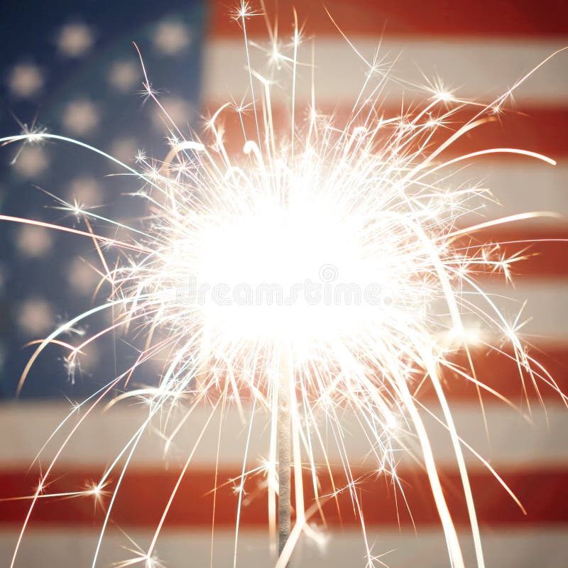 Sparkler Burning in Front of American Flag Stock Image - Image of spark ...